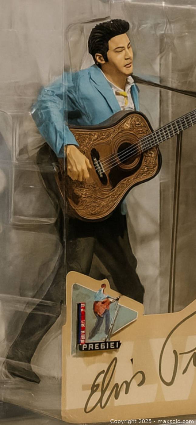 Sealed Elvis Presley performance figurine | Maxsold