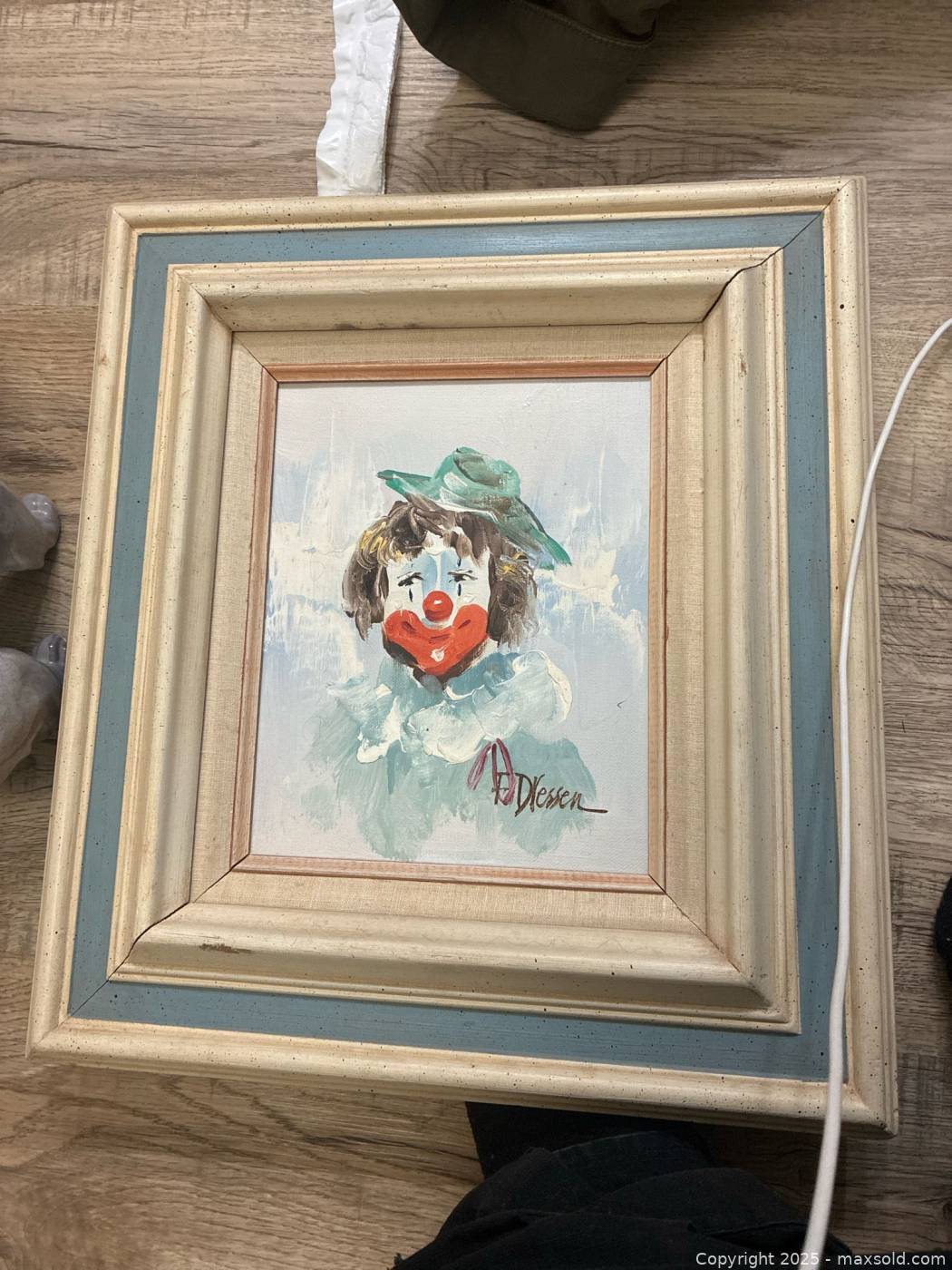 Original signed clown portrait painting in carved frame | Maxsold