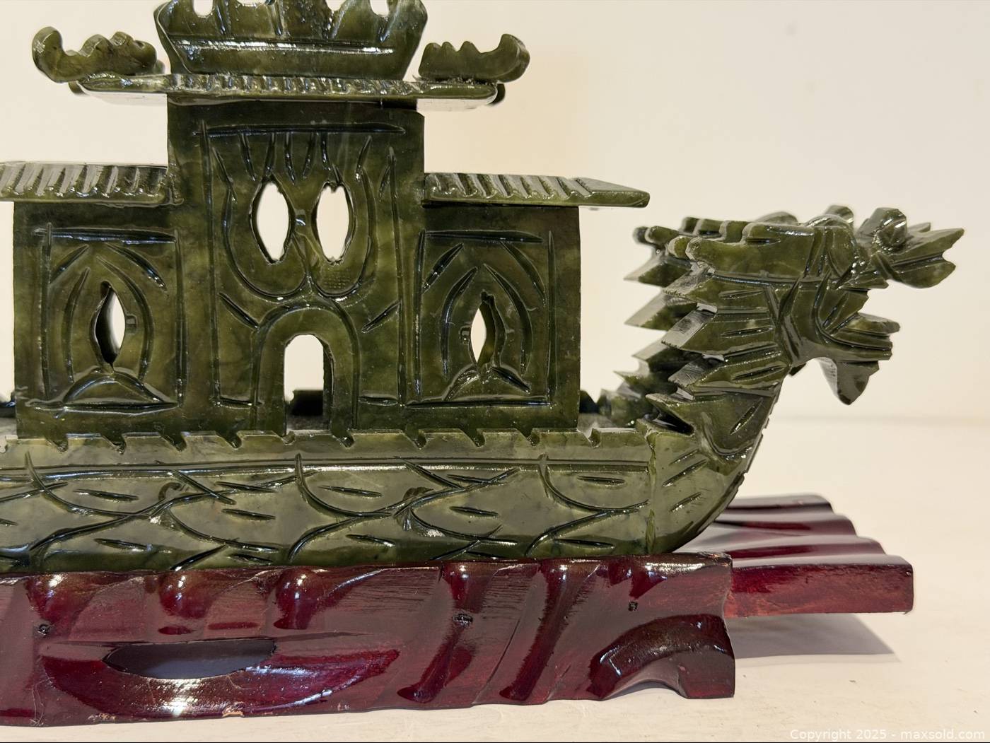 Burmese jade dragon boat sculpture on stand | Maxsold