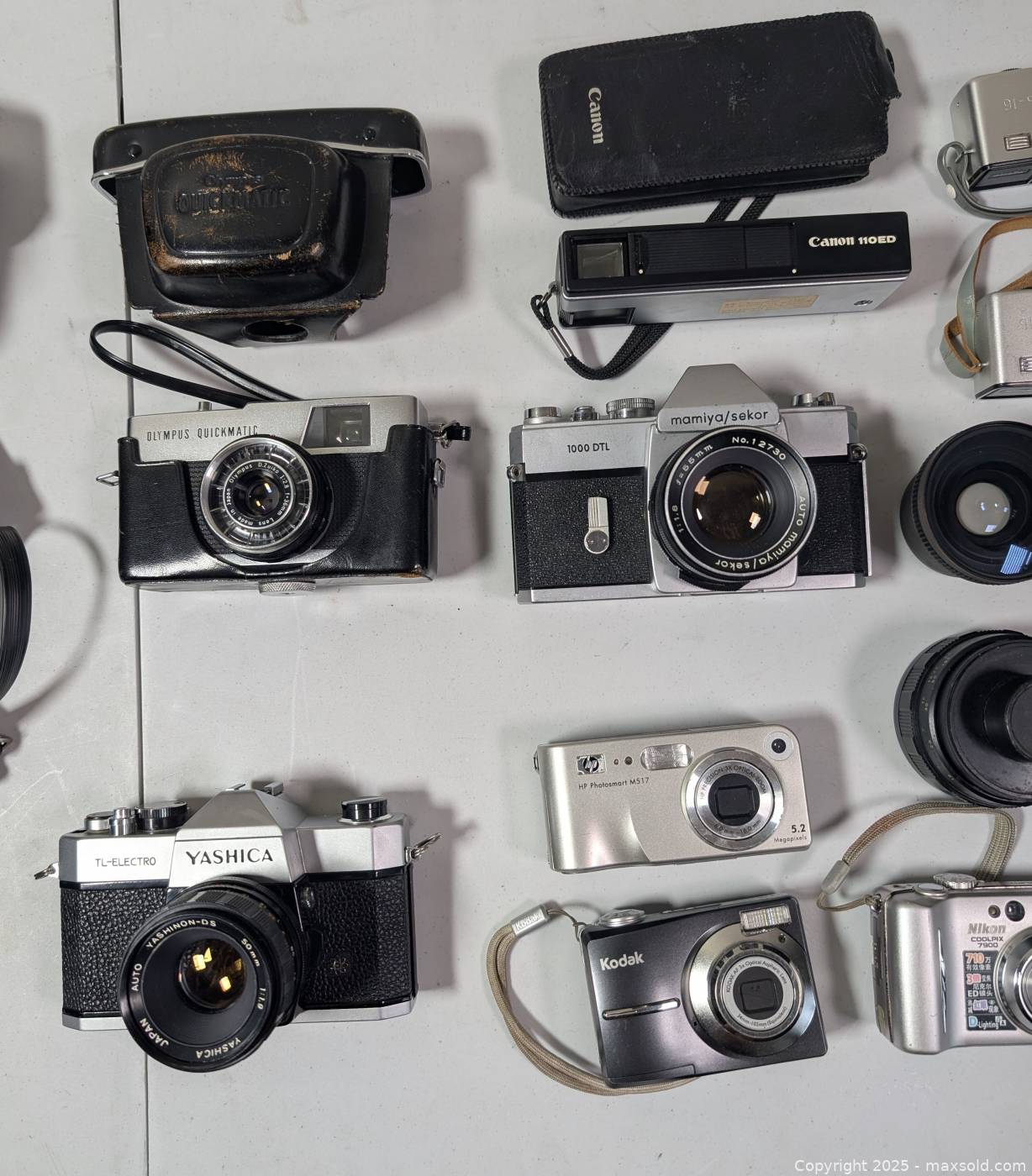 Vintage film & digital camera assortment | Maxsold
