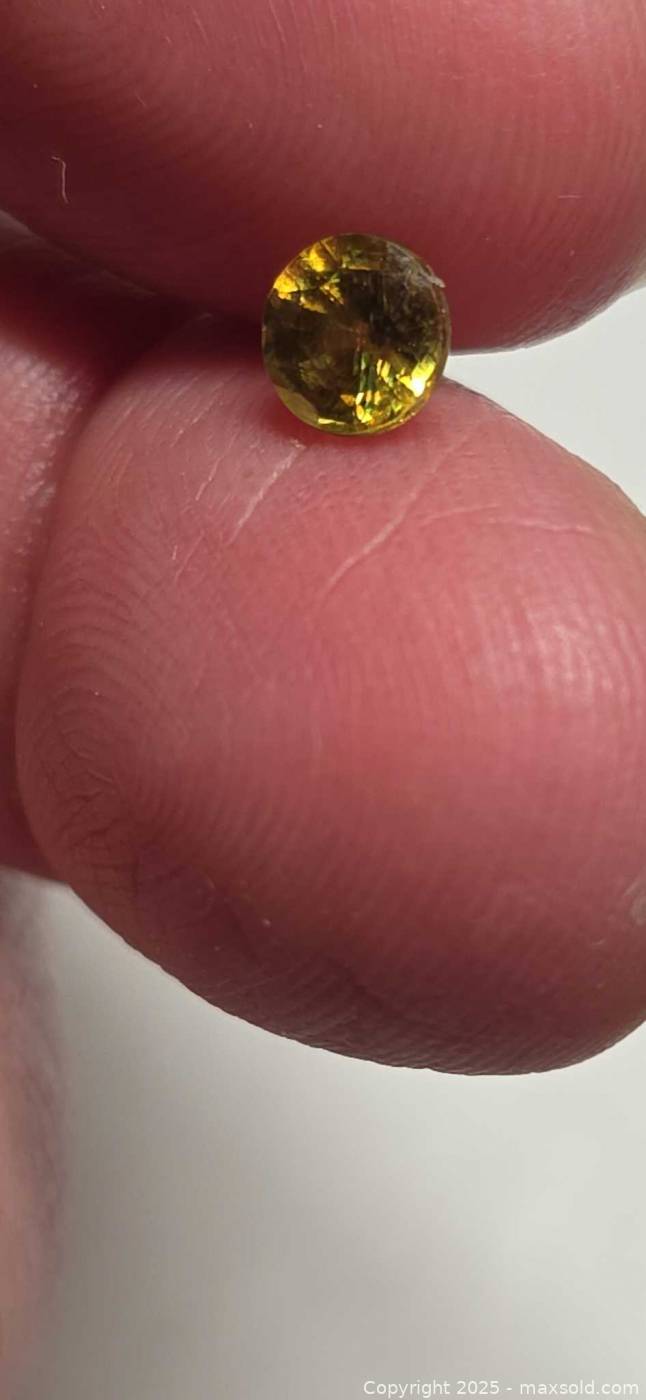 0.97ct African sphene gemstone | Maxsold