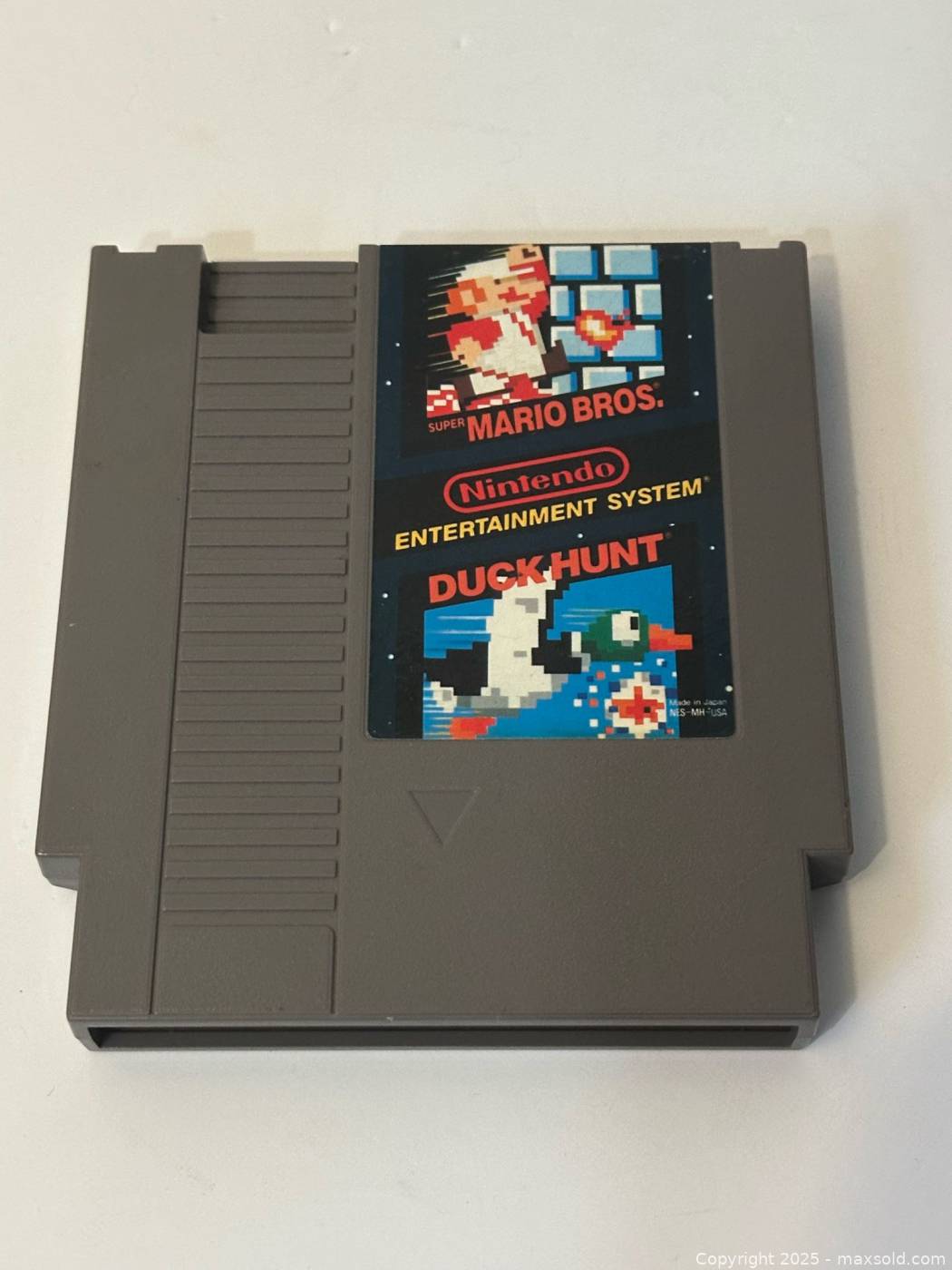 1985 Nintendo NES Super Mario Bros./Duck Hunt cartridge | Maxsold