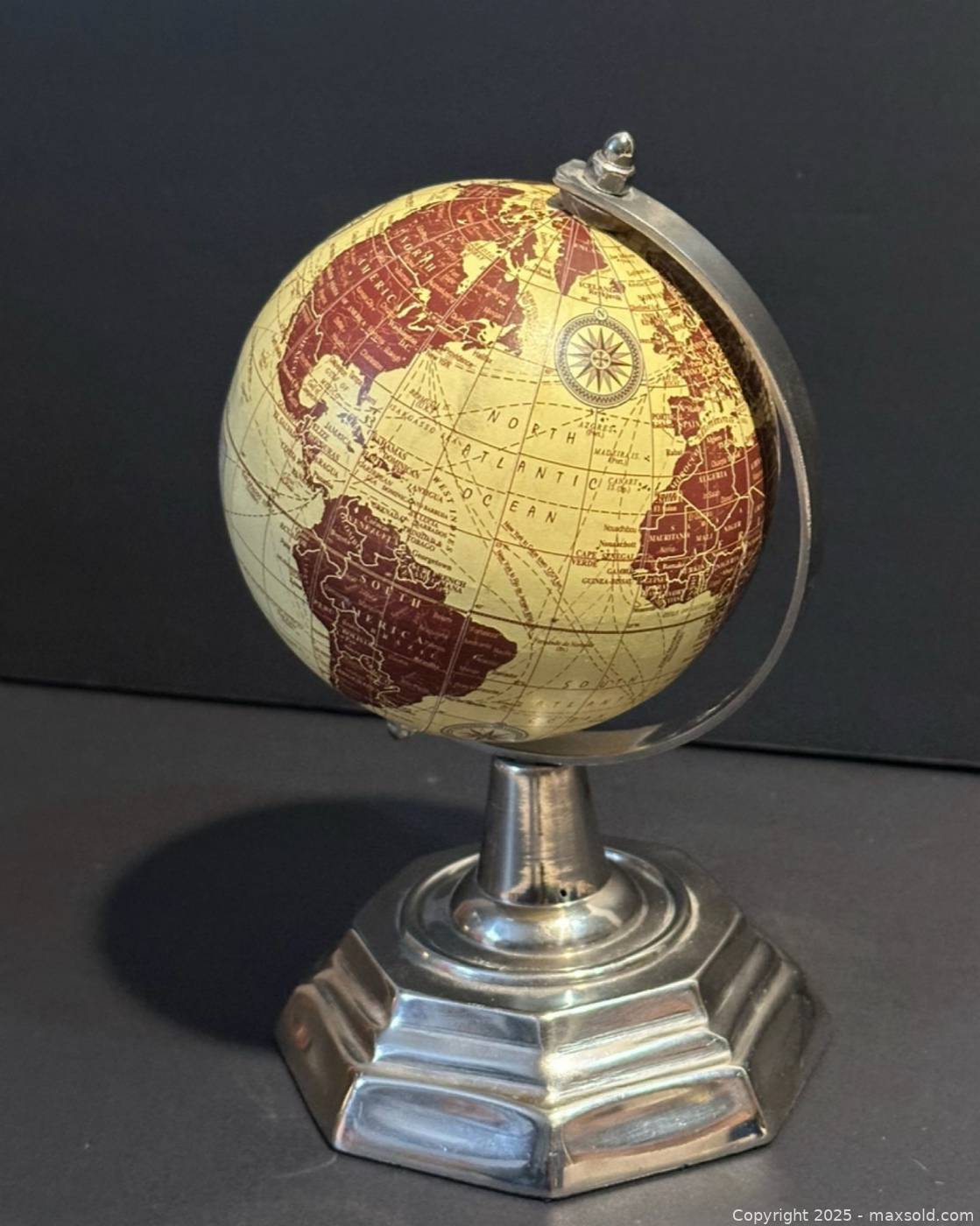 Vintage mini world globe on metal base | Maxsold