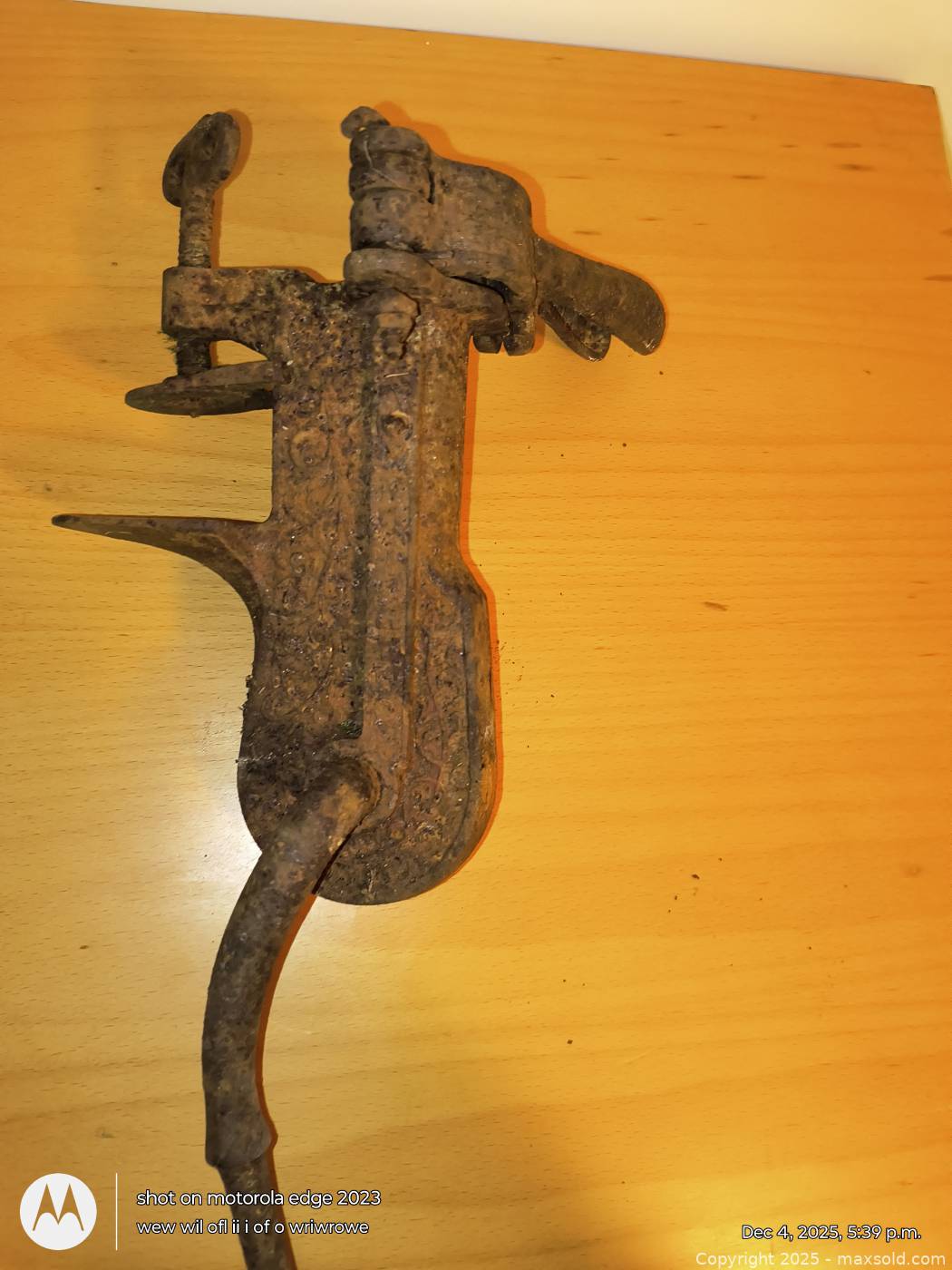 Antique cast iron grinding tool 14" | Maxsold