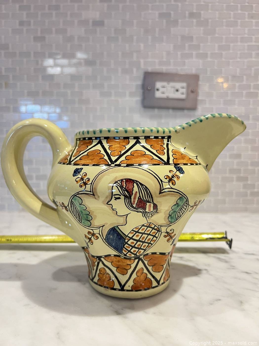Hand-painted Italian ceramic pitcher | Maxsold