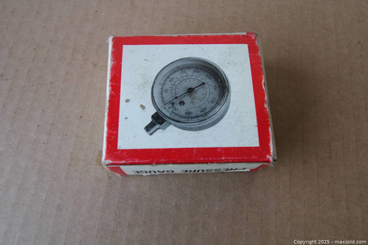 Pressure discharge gauge with box | Maxsold