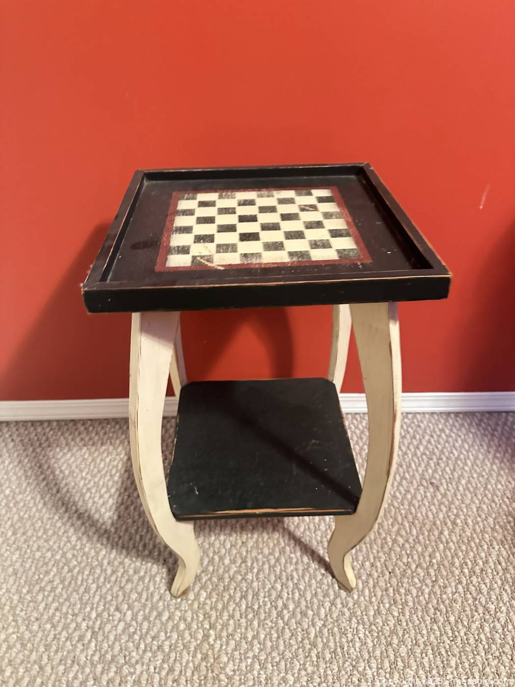 Vintage distressed checkerboard side table | Maxsold
