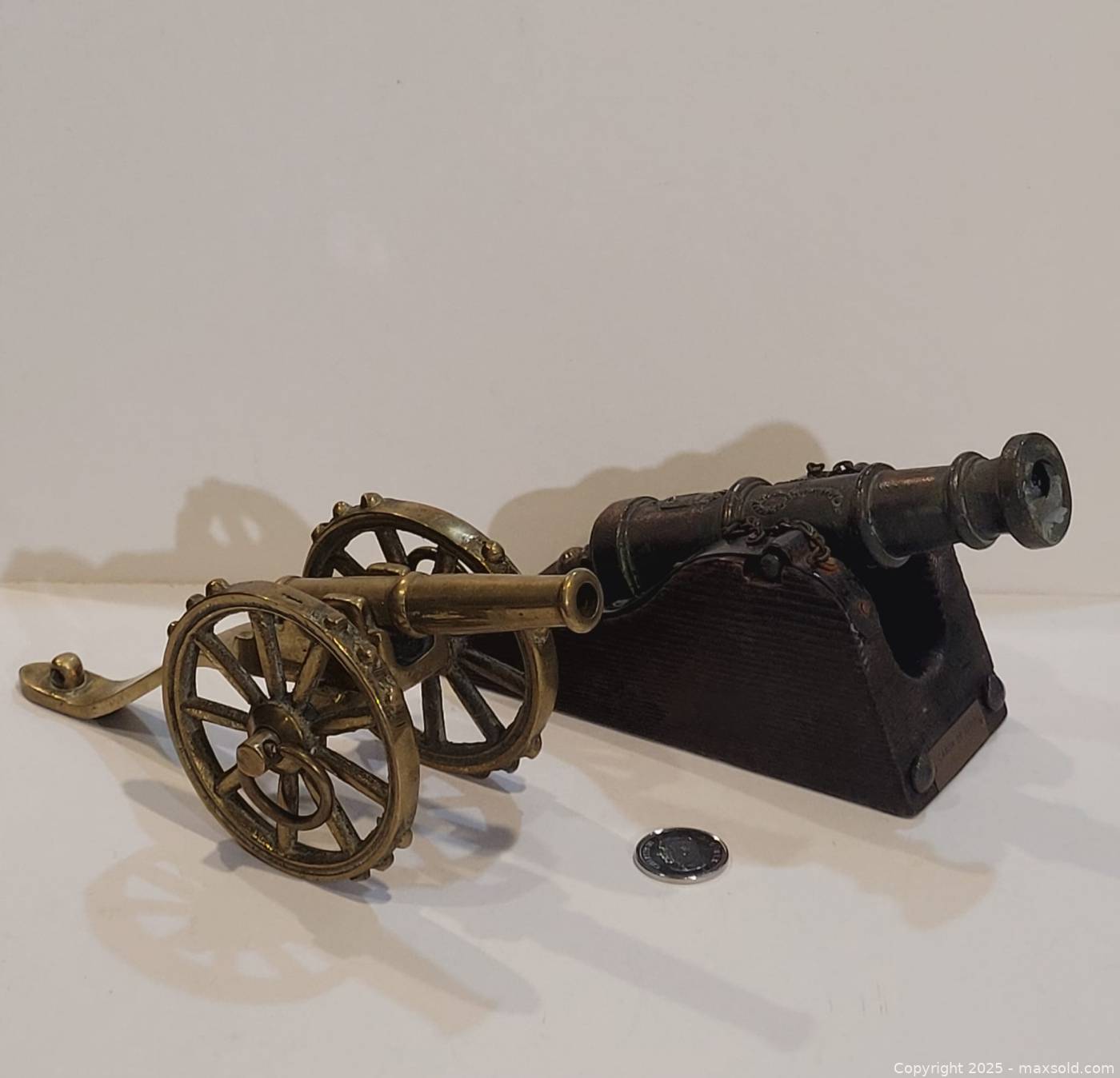Pair of vintage brass decorative cannons | Maxsold