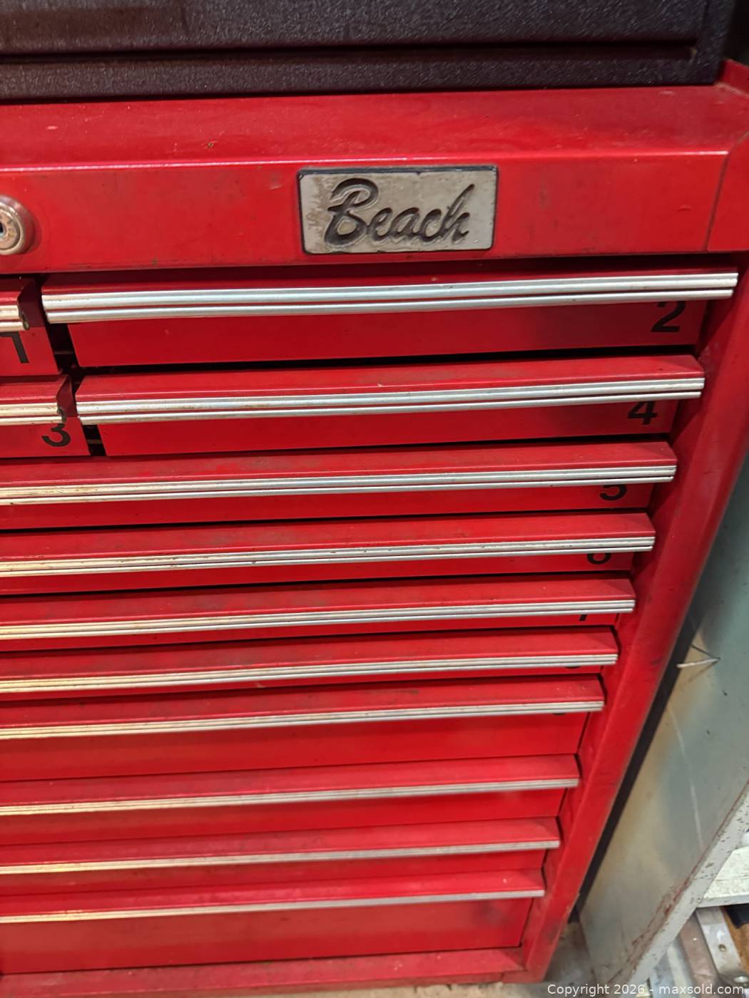 Beach red rolling tool cabinet 27x18x42in | Maxsold