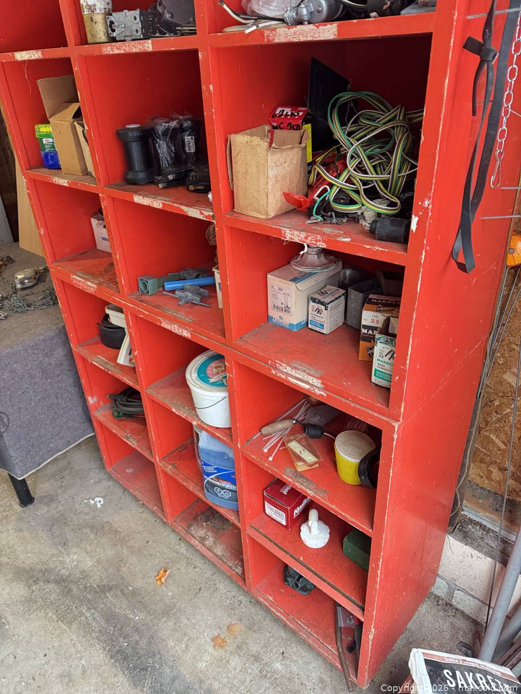 Two red wooden workshop shelving units | Maxsold