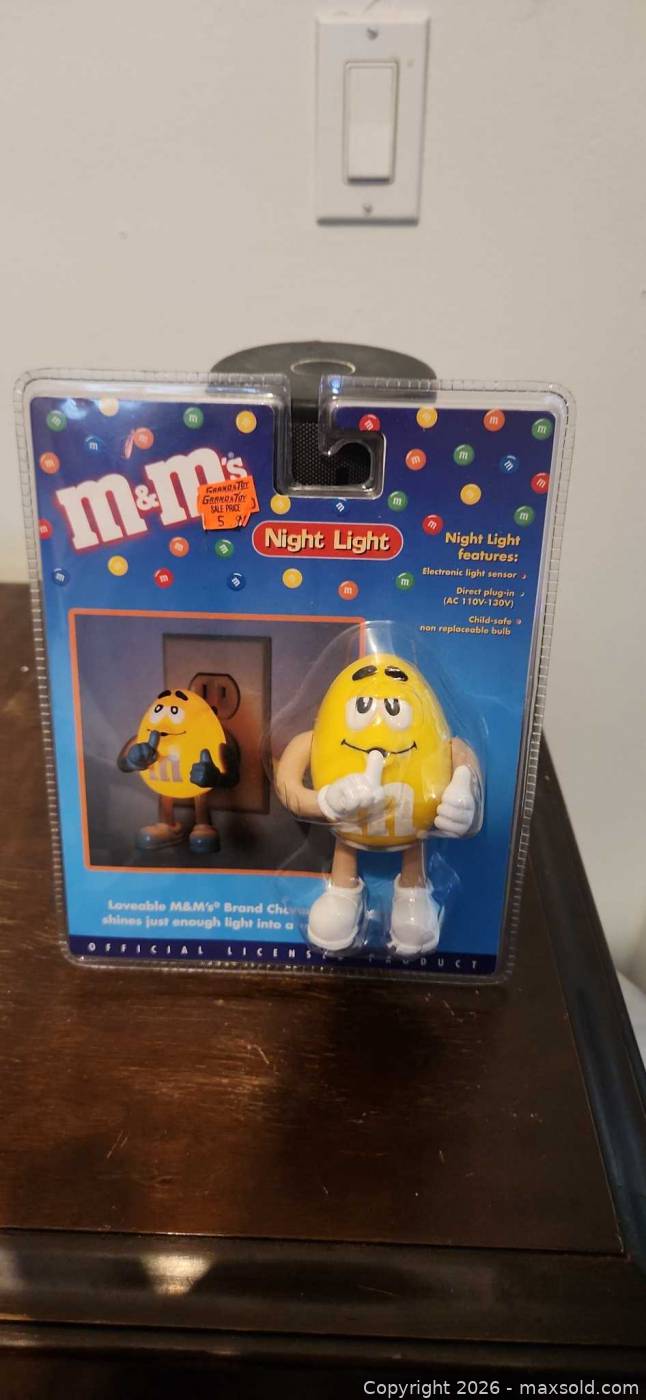 Yellow M&M's character night light | Maxsold