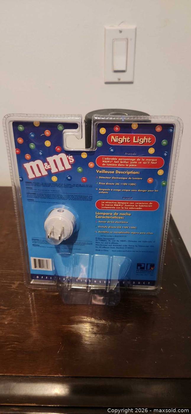 Yellow M&M's character night light | Maxsold