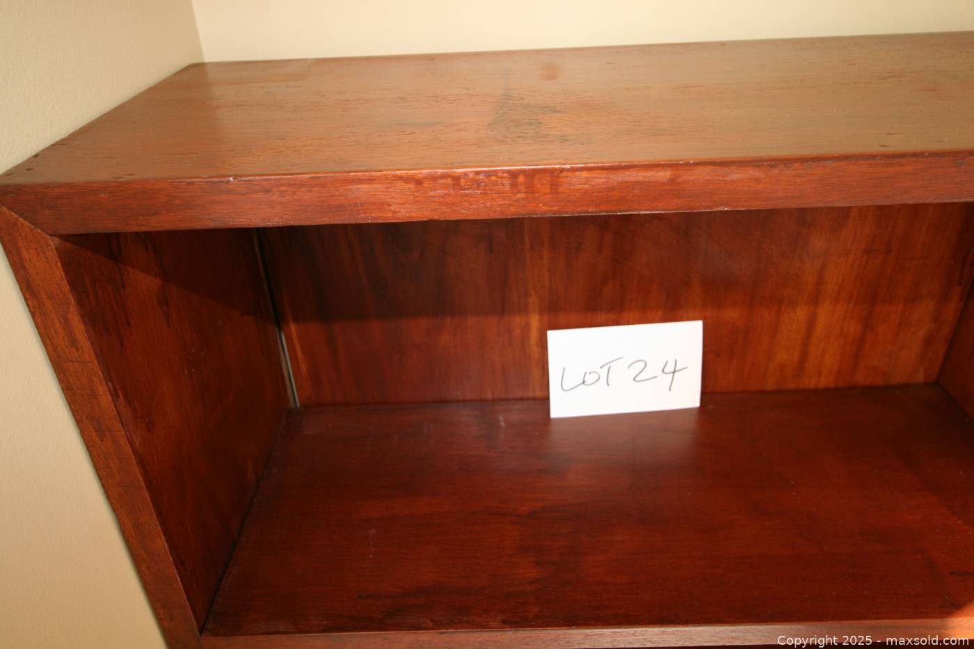 Solid wood dark brown wall-mount bookshelf 48.5"H | Maxsold