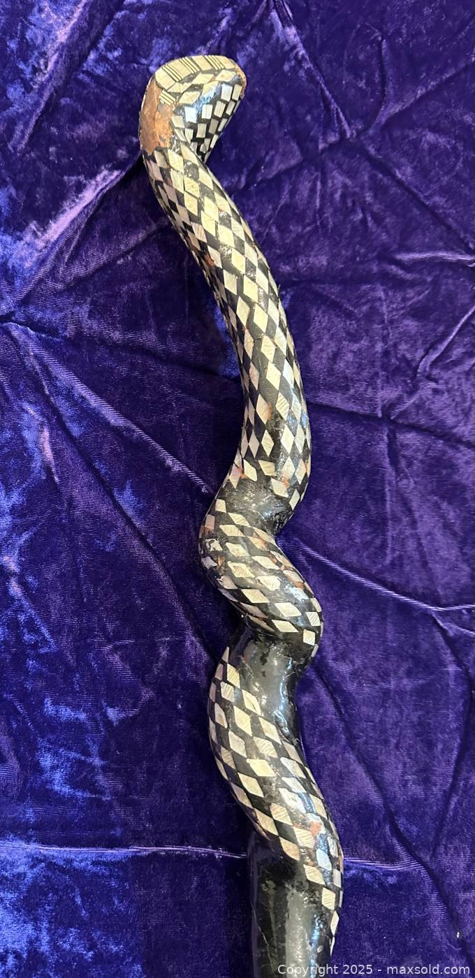 Diamond python cane and chrome baton | Maxsold