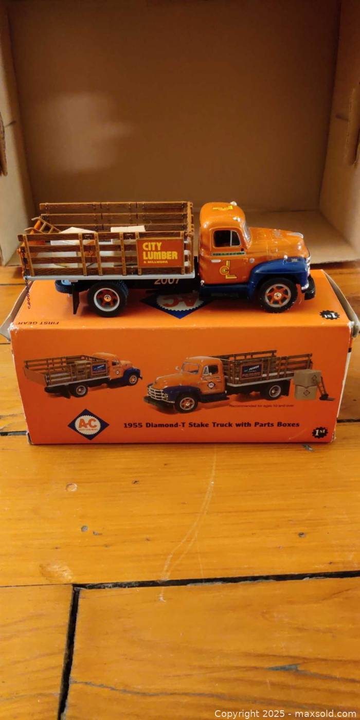 1:34 Scale Die-Cast 1955 Diamond-T Stake Truck Model With Box | Maxsold