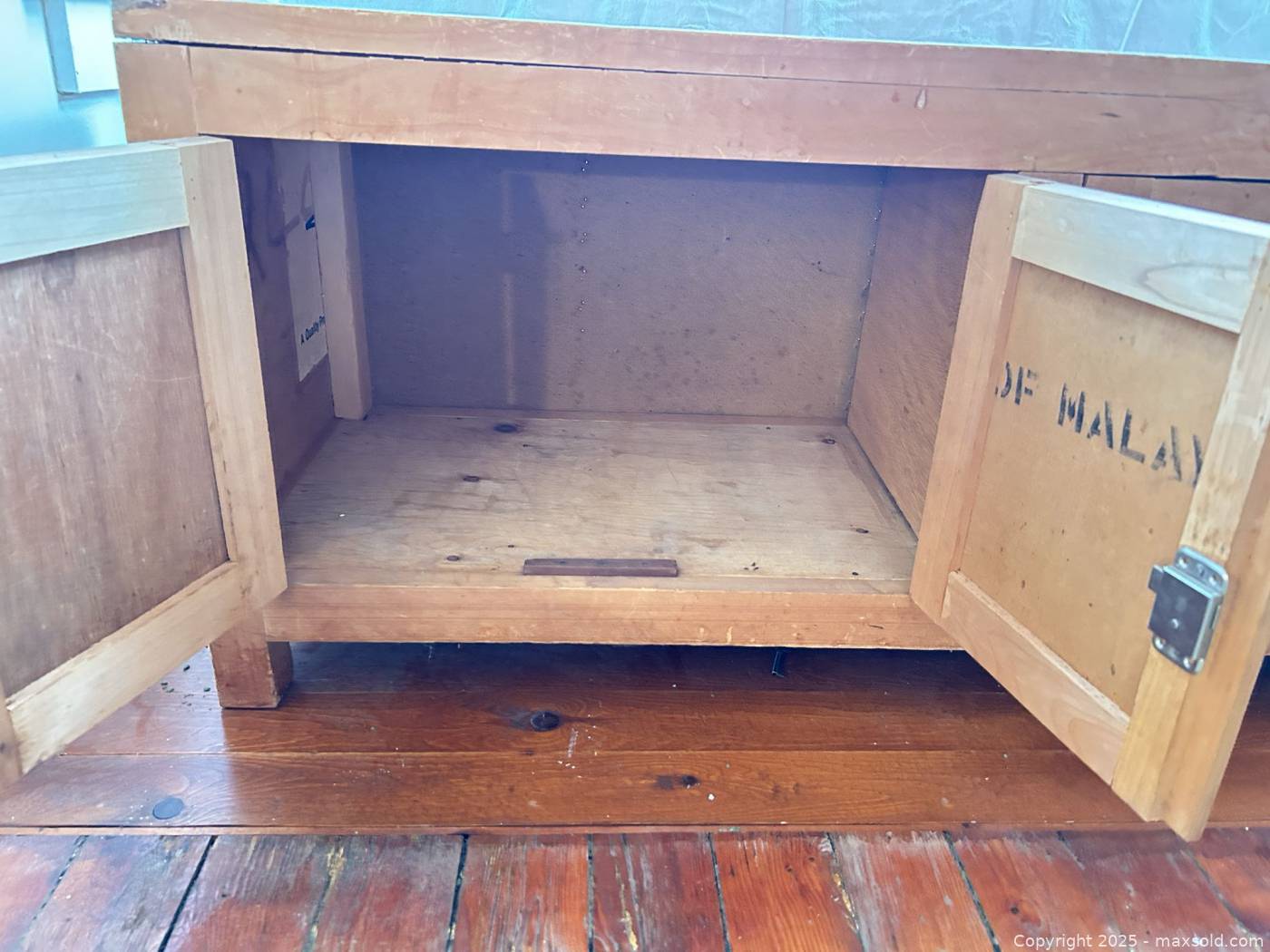 Solid wood four-door storage cabinet | Maxsold