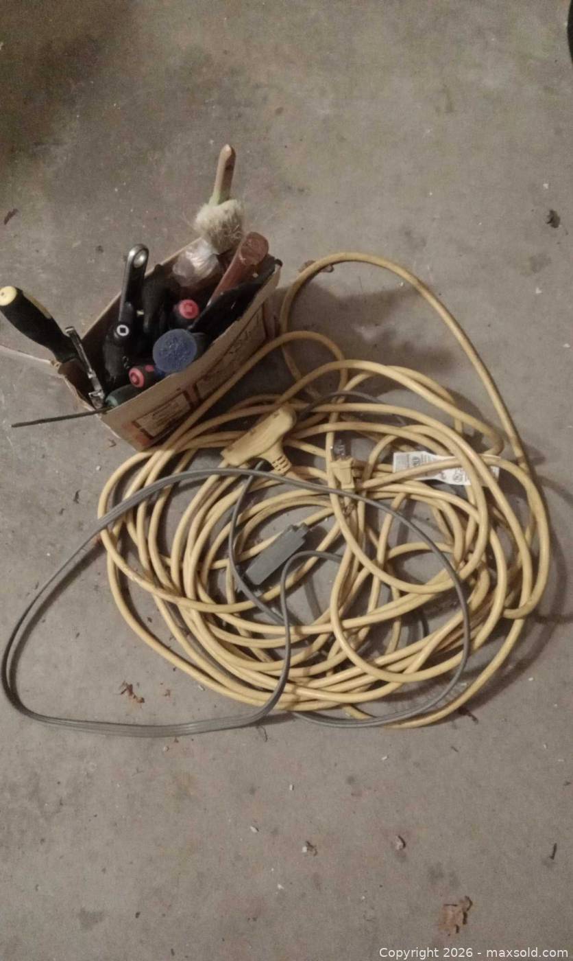 Extension cords with assorted hand tools | Maxsold