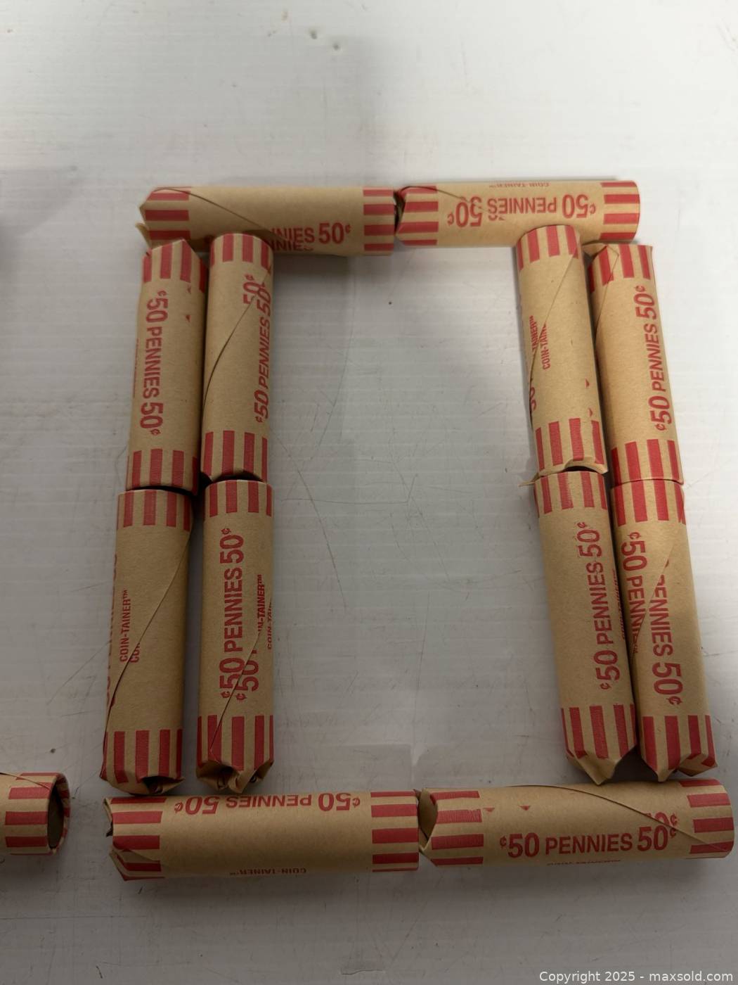 $10 face value rolled pennies | Maxsold