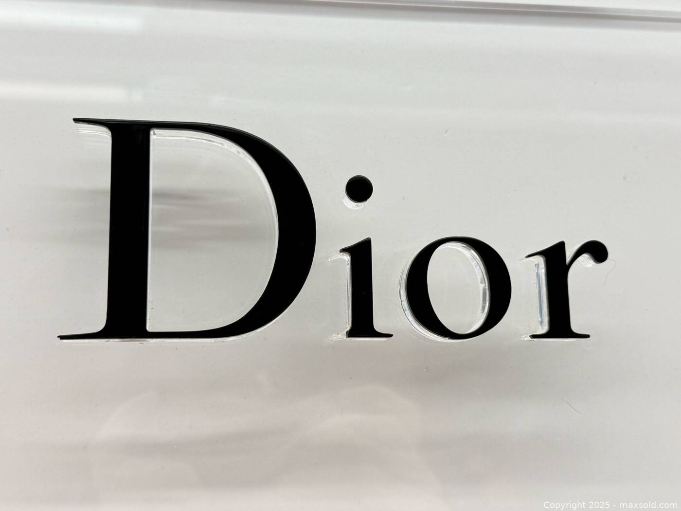 Christian Dior lucite store display sign | Maxsold