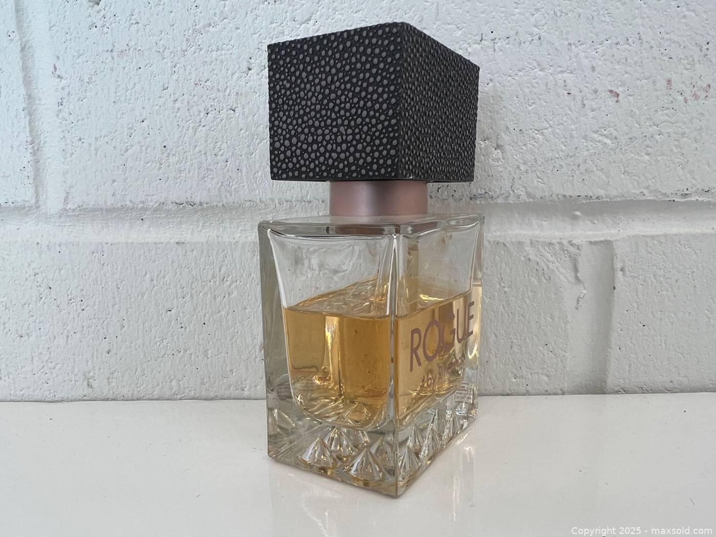 Rogue by Rihanna perfume bottle | Maxsold