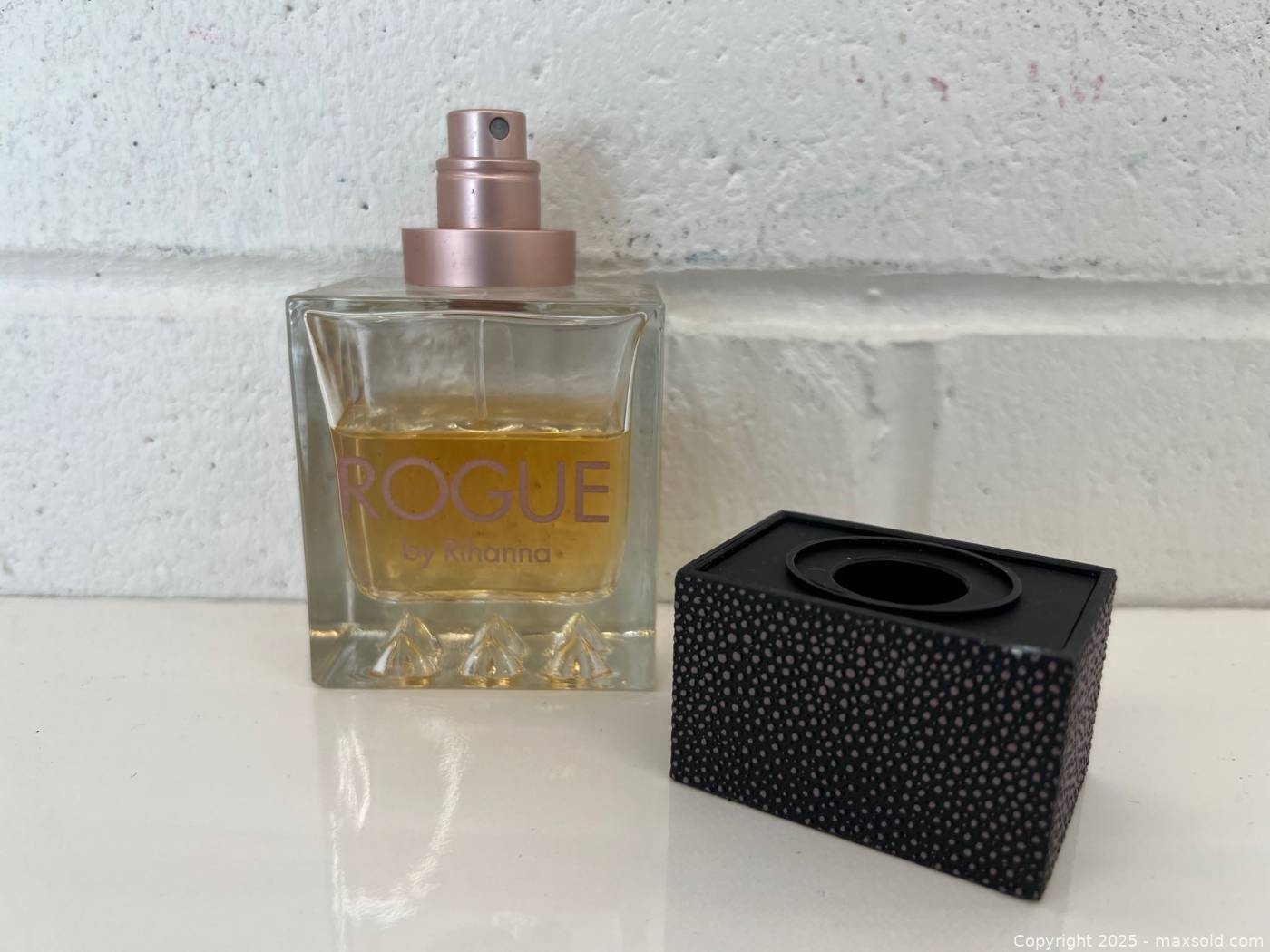 Rogue by Rihanna perfume bottle | Maxsold