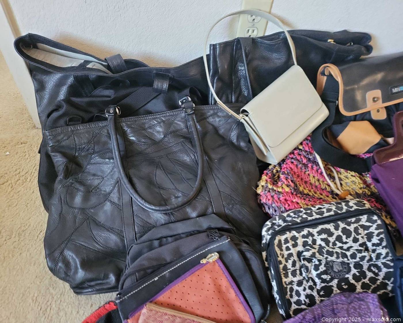 Assorted handbags purses & wallets lot | Maxsold