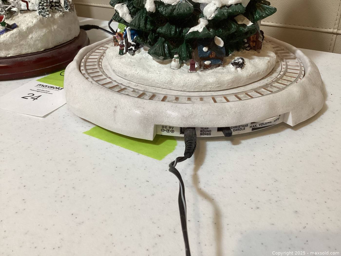 Resin lighted musical Christmas tree and illuminated village | Maxsold