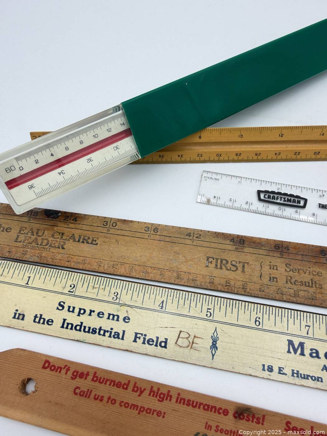 9 assorted measuring rulers | Maxsold