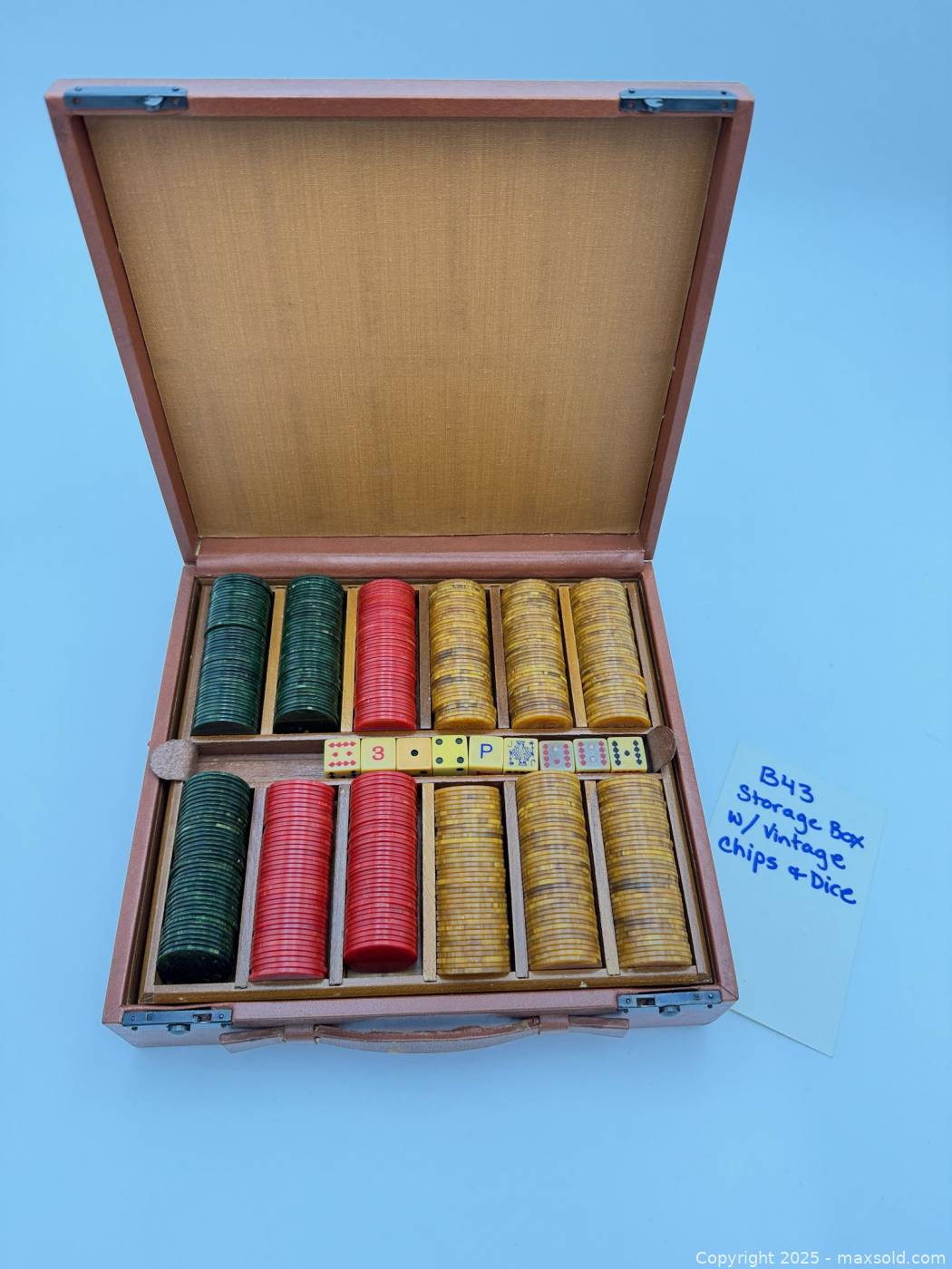 Wooden poker chip storage case with vintage chips and dice | Maxsold