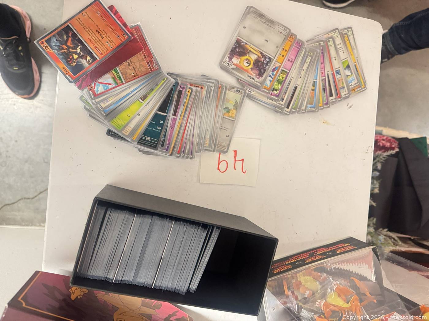 Pokémon trading cards and sealed action figure | Maxsold