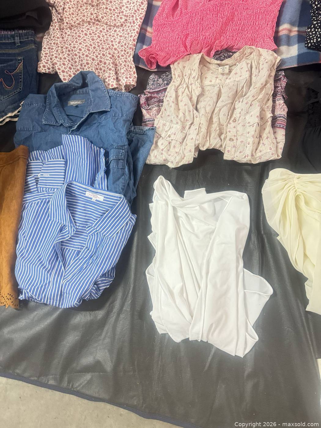 Women’s clothing assortment with bins | Maxsold