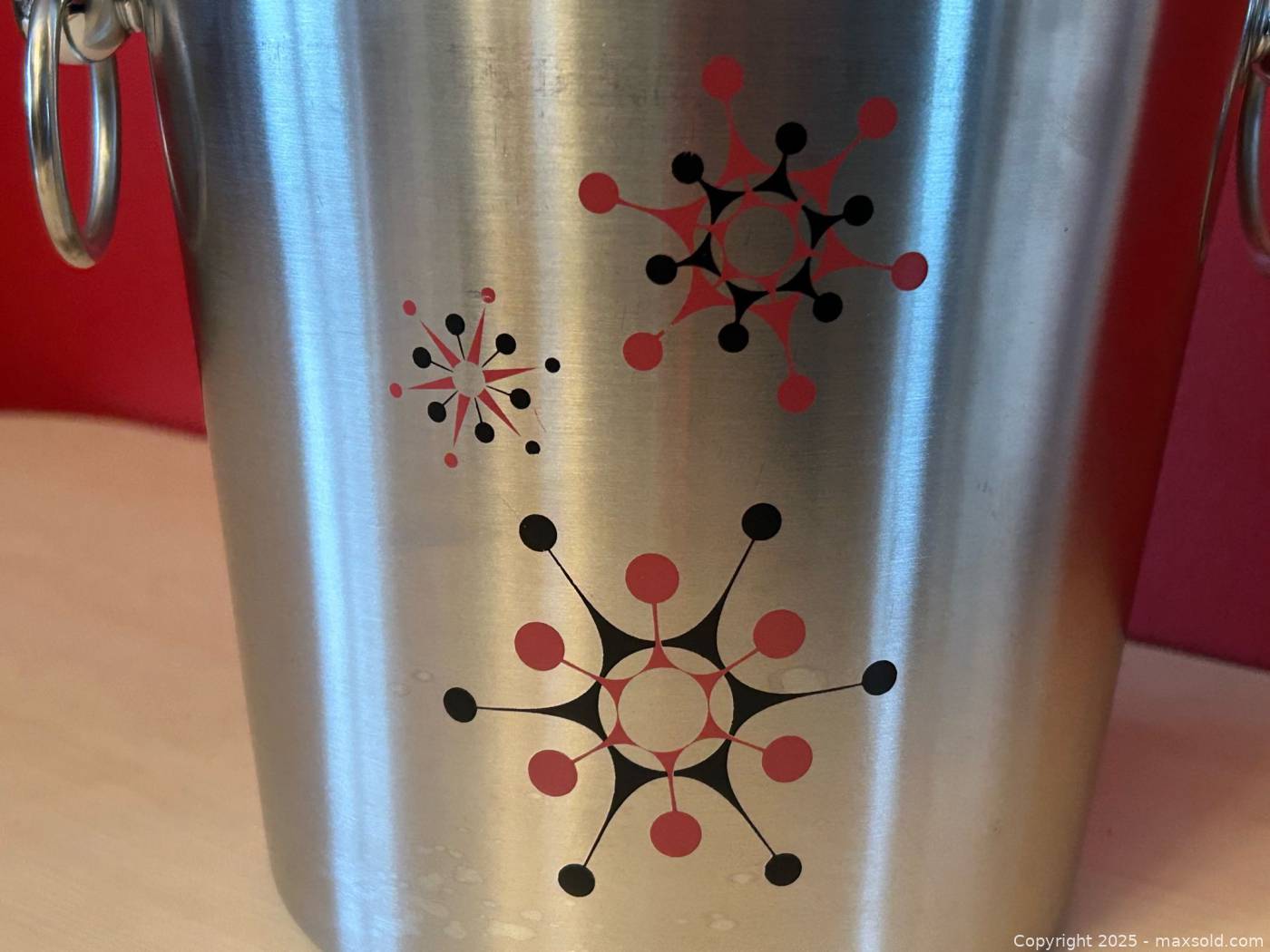 Stainless steel atomic motif ice bucket | Maxsold