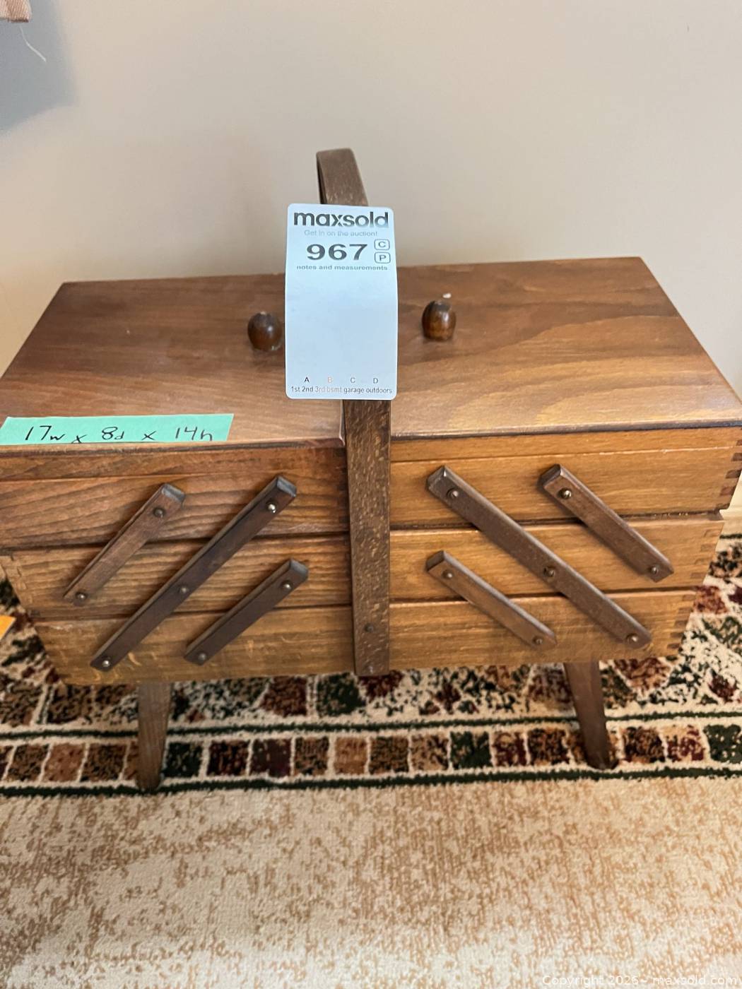 Wood cantilever sewing box with notions | Maxsold