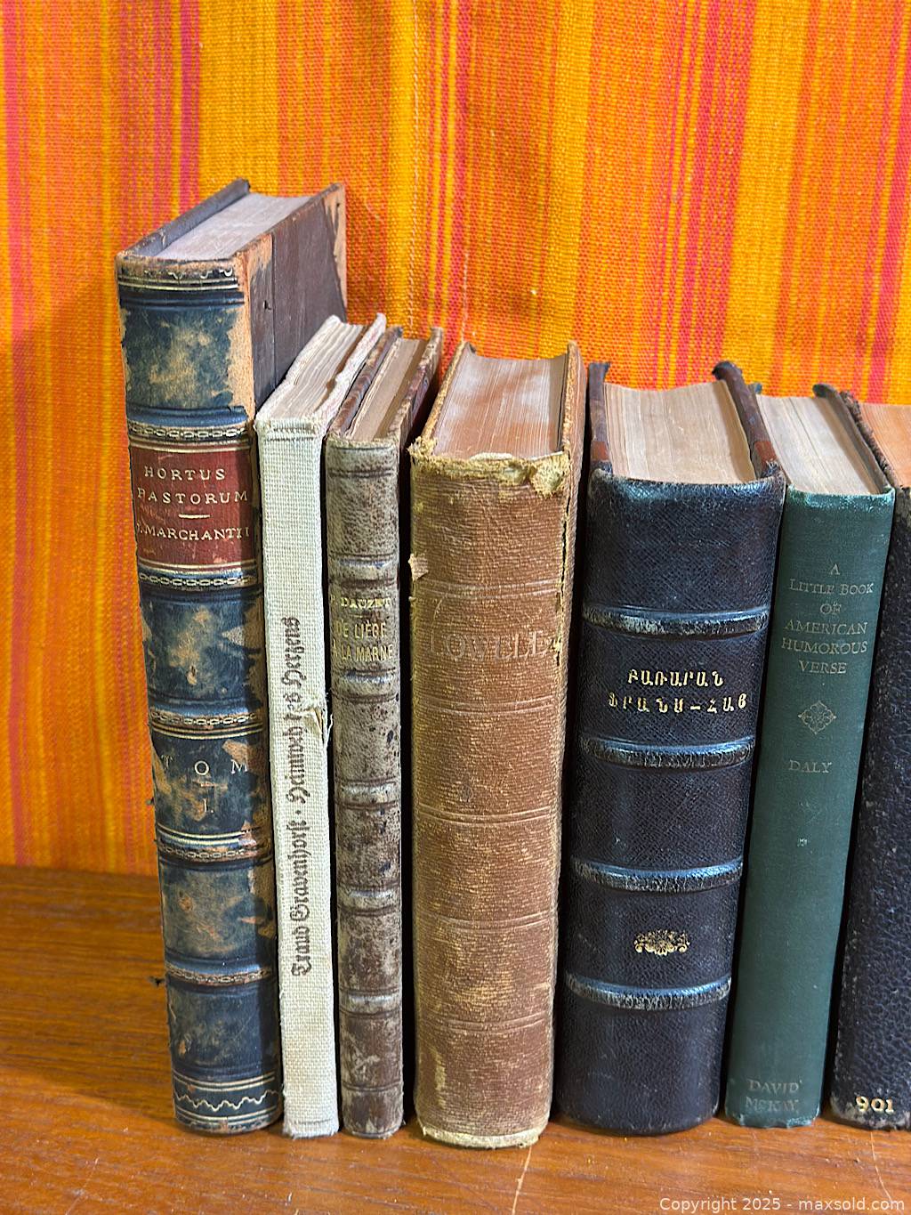 Collection of antique leather-bound books | Maxsold
