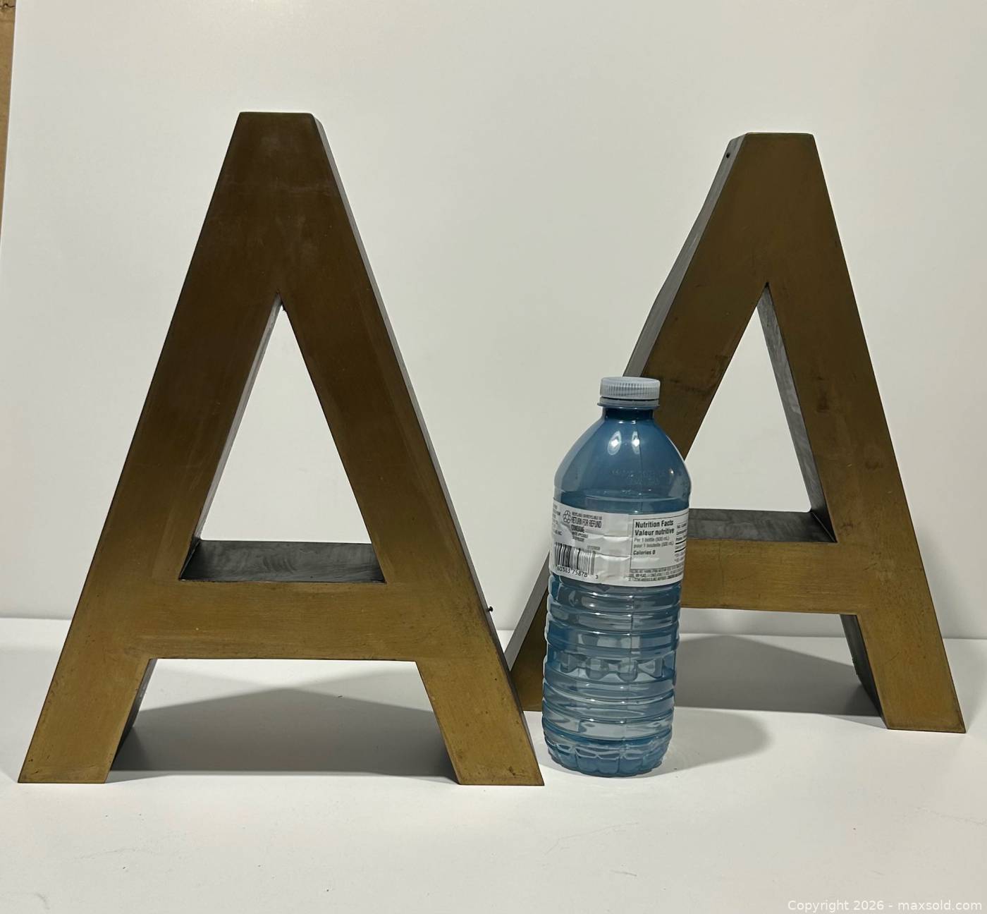 Pair brass dimensional letter A 12" | Maxsold