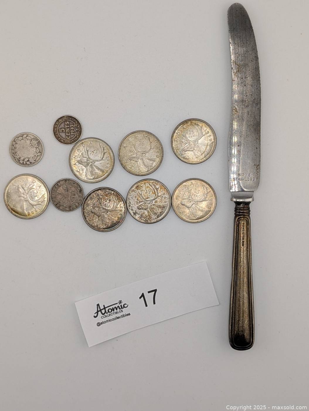 Silver coins and Birks sterling-handle knife | Maxsold