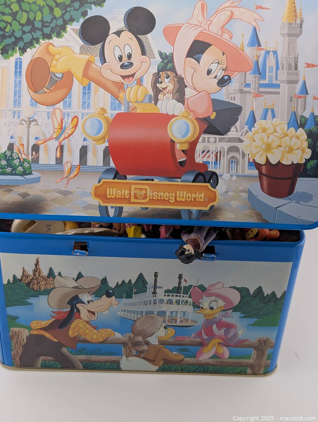 Disney metal tin with ~60 mini character figurines | Maxsold