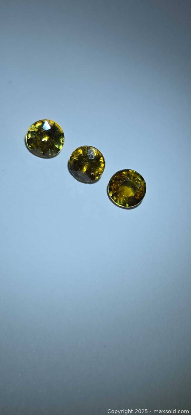 African sphene gemstone trio 2.10ct | Maxsold