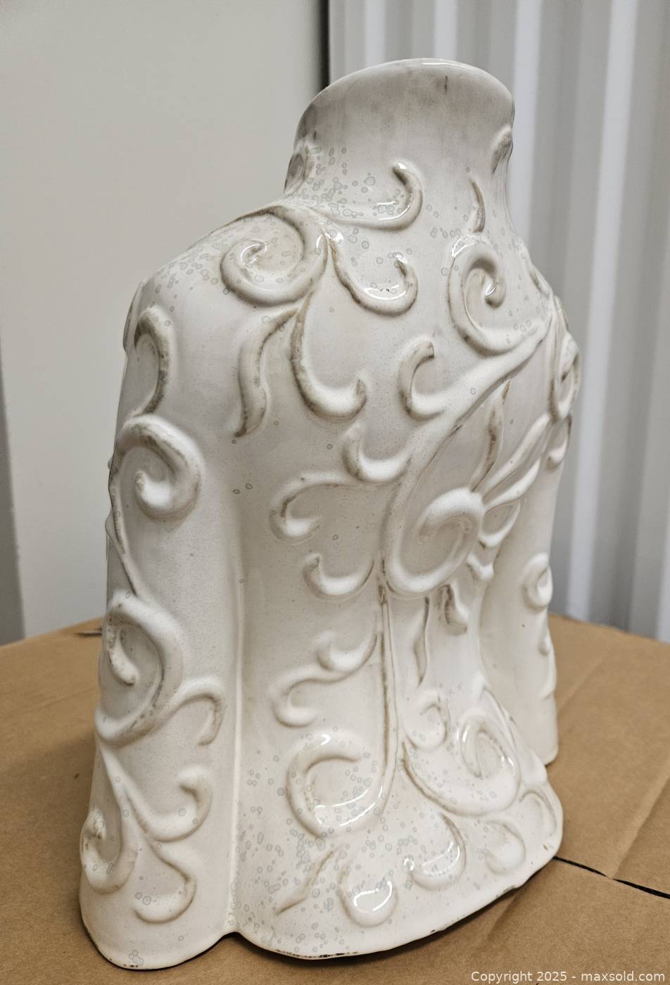 Off-white glazed ceramic torso jacket vase | Maxsold
