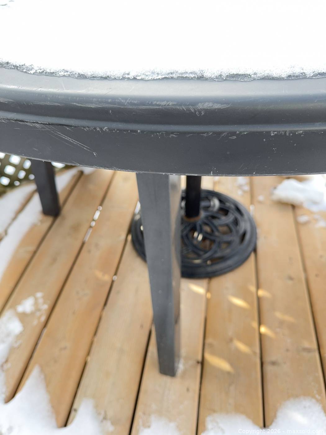 Round patio table and umbrella stand | Maxsold