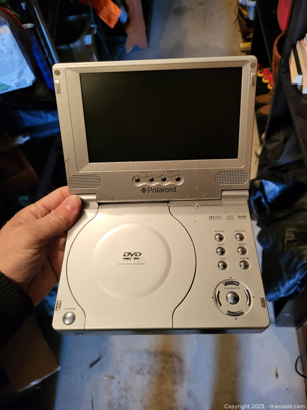 Polaroid PDV-0700K Portable DVD Player | Maxsold