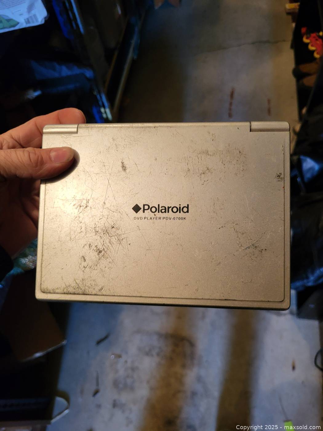 Polaroid PDV-0700K Portable DVD Player | Maxsold