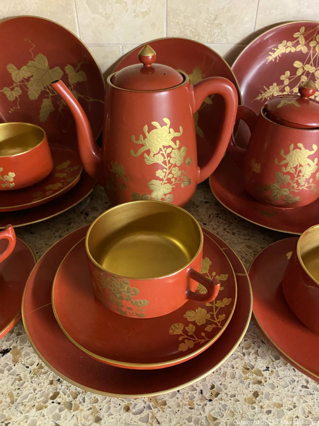 Red lacquer gilt floral lacquerware tea service | Maxsold