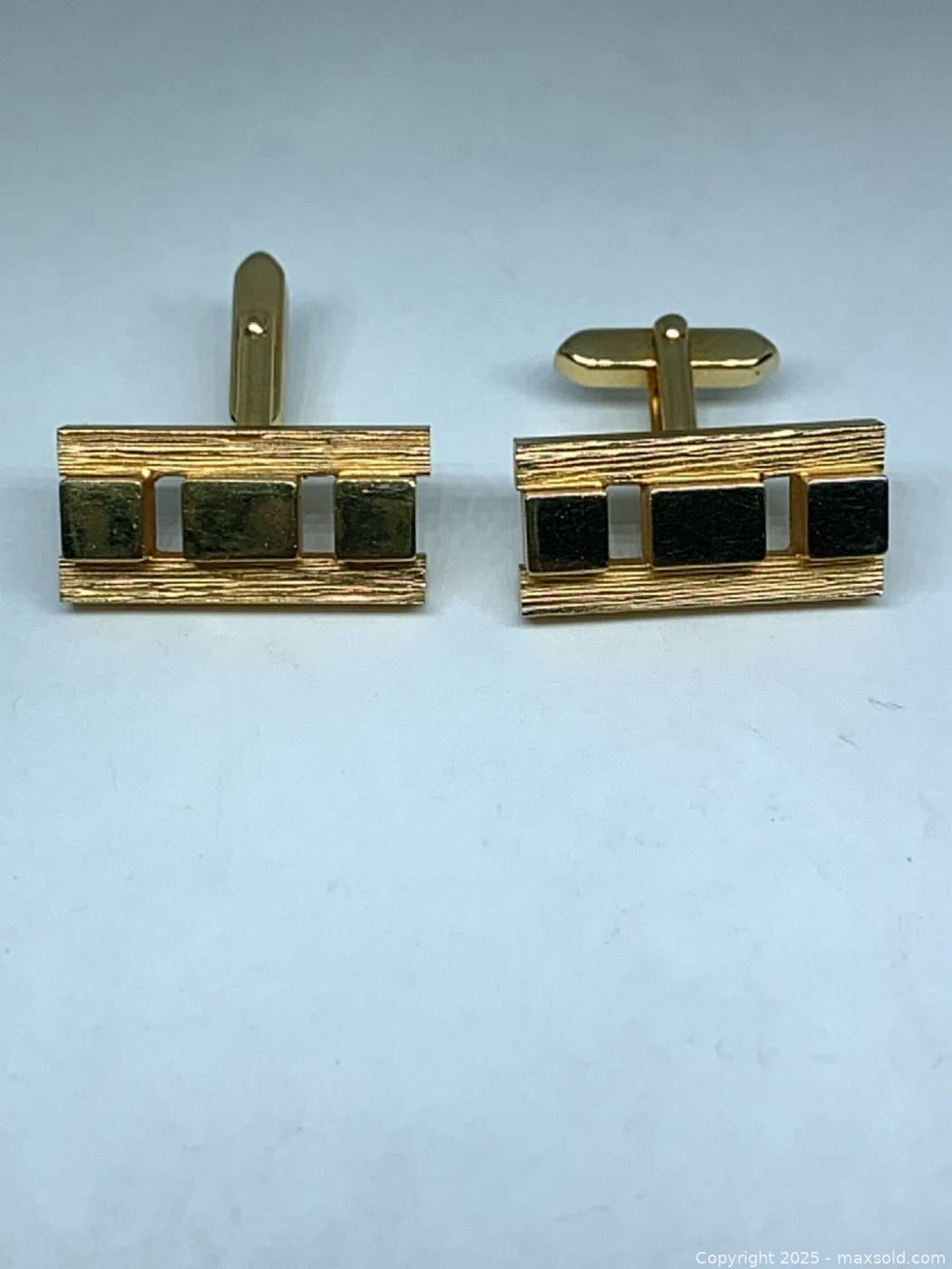 Brass gold-tone bullet back cufflinks | Maxsold