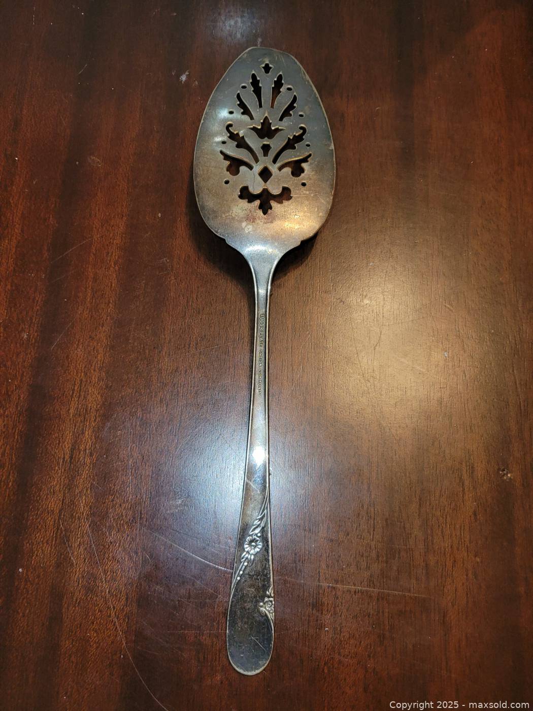 Wm Rogers and Tudor Plate silverplate serving spoons | Maxsold