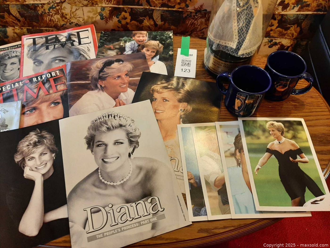 Princess Diana magazines, wedding mugs, Queen Elizabeth doll | Maxsold