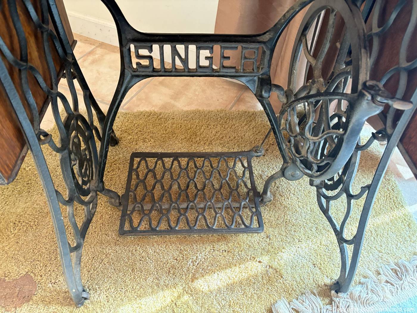 Singer treadle sewing machine with oak cabinet | Maxsold