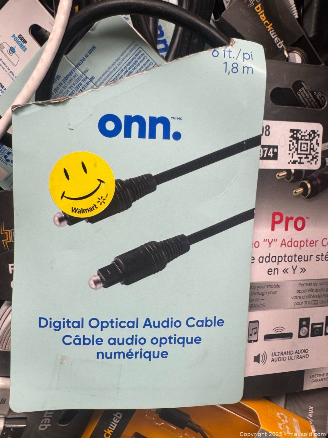 Bin of HDMI, optical, Lightning & AV cables | Maxsold