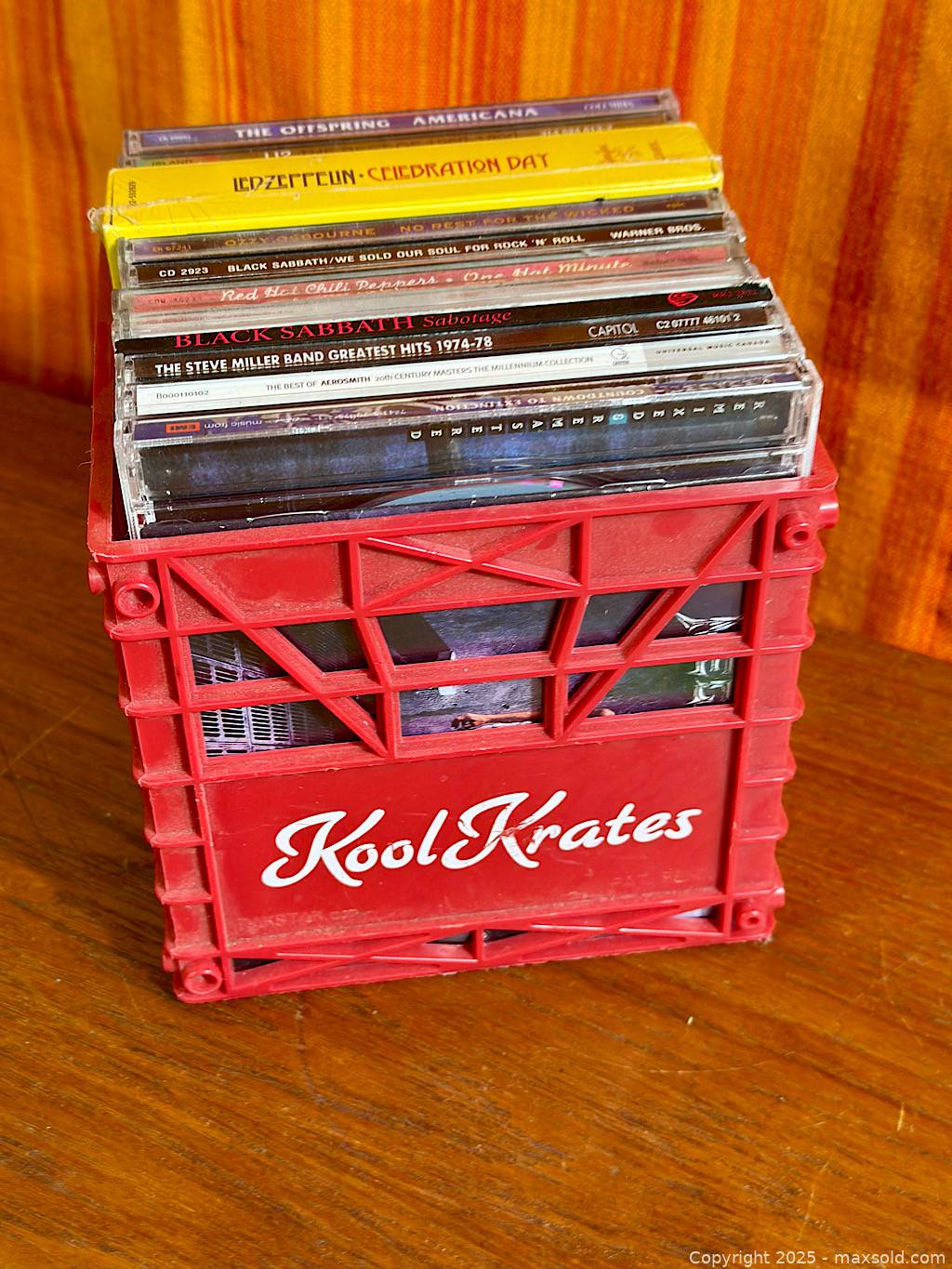Crate Of Rock CDs With Sealed Led Zeppelin | Maxsold