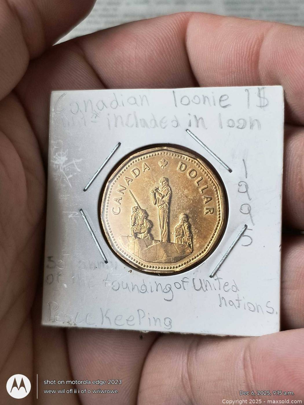 1995 Canada 1-dollar loonie coin in holder | Maxsold